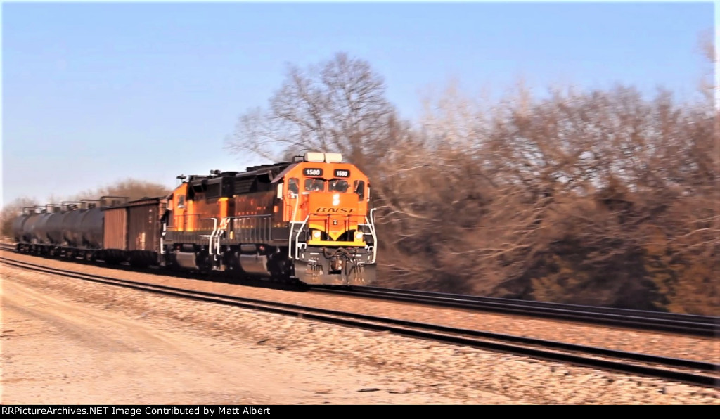BNSF 1580 leading local 21 westbound into the setting sun